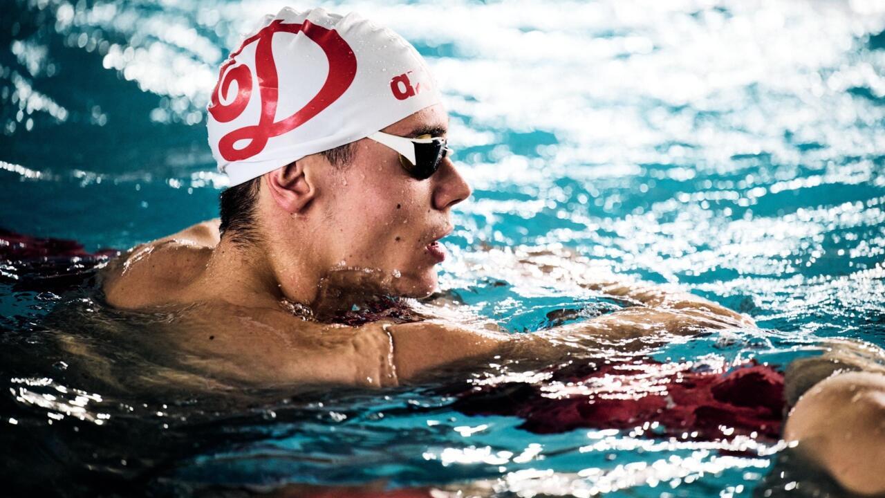 David Popovici în finala probei de 100 m liber a Campionatului din cadrul Campionatului Mondial ...